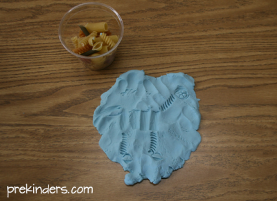 Dinosaur Pasta Skeletons - PreKinders Preschool Activities
